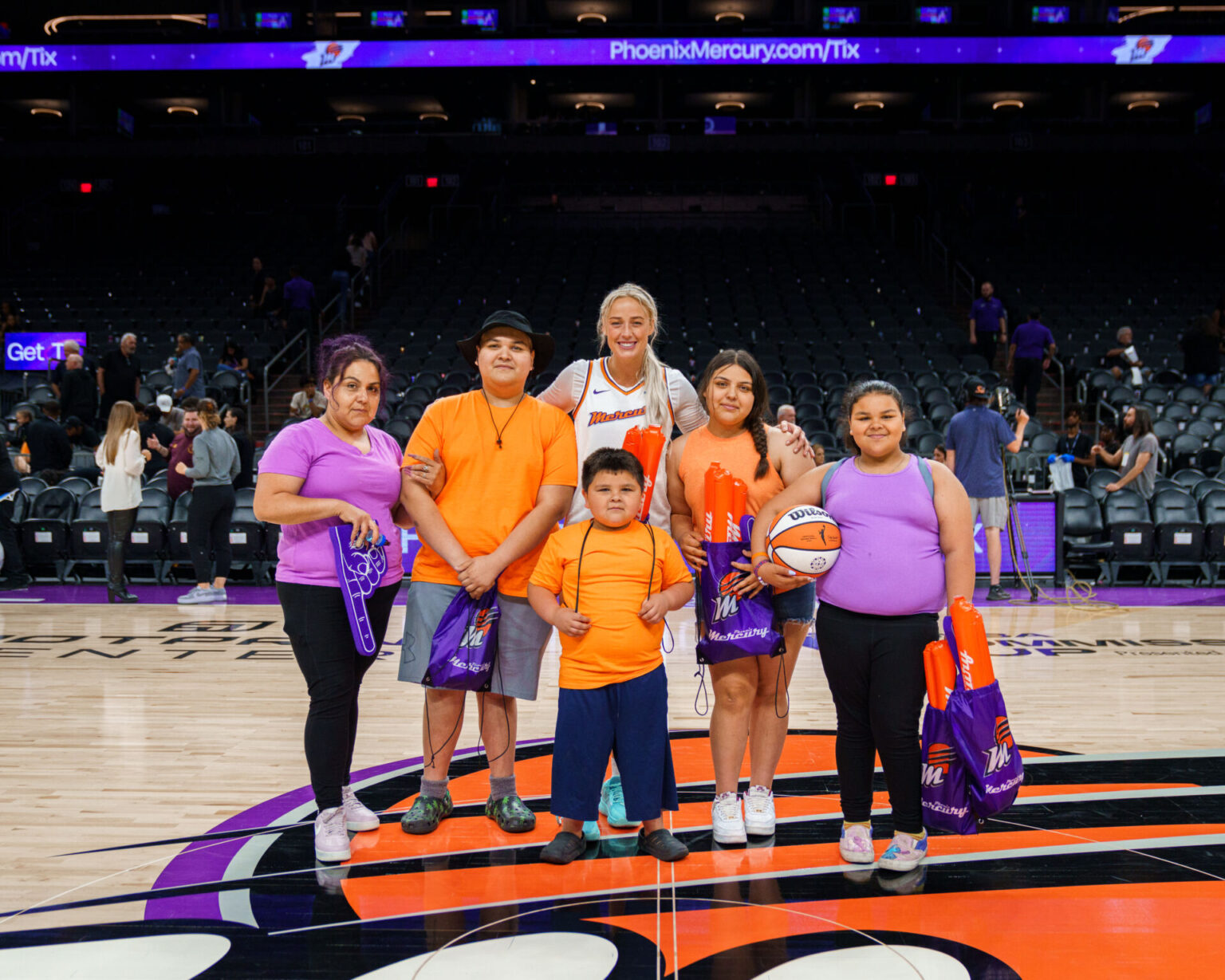 WNBA Star Cunningham Giving Back to the Community One Family at a Time ...